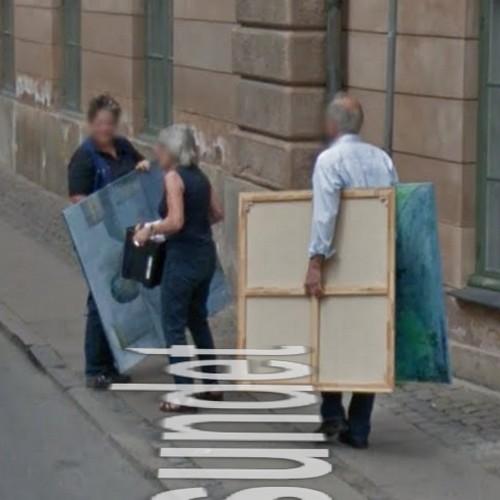 Carrying paintings in Copenhagen, Denmark - Virtual Globetrotting