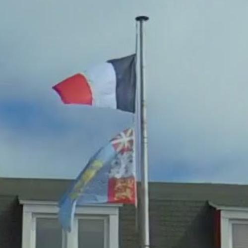 Two flags in St Pierre, Saint Pierre and Miquelon (Google Maps)