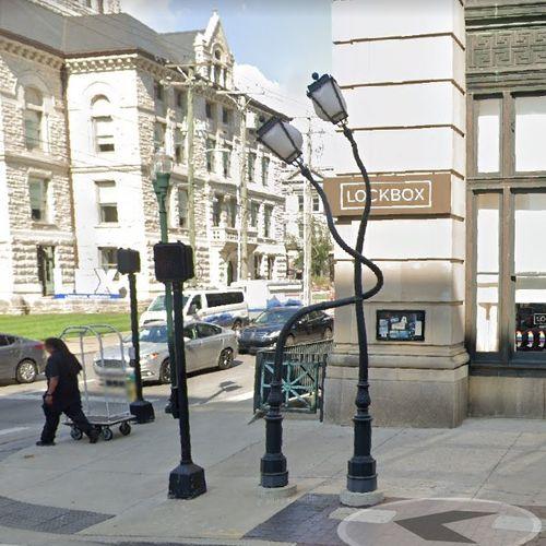 Twisted street lights in Lexington, KY (Google Maps)