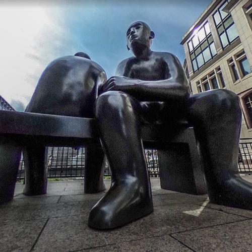 'Two Men on a Bench' by Giles Penny in Poplar, United Kingdom (Google Maps)