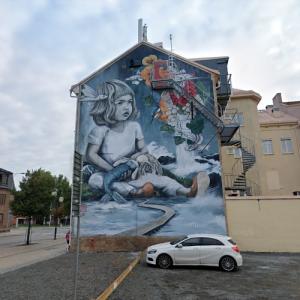 Mural by Lula Goce in Kristianstad, Sweden - Virtual Globetrotting