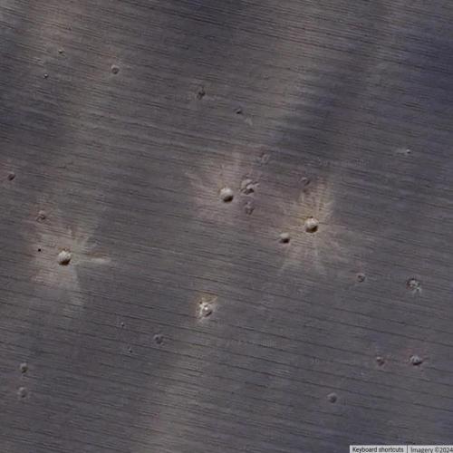 Blast craters near Hostomel Airport in Hostomel, Ukraine (Google Maps)