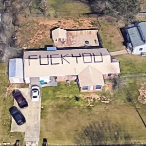 'Fuck You' on roof in Moss Point, MS - Virtual Globetrotting