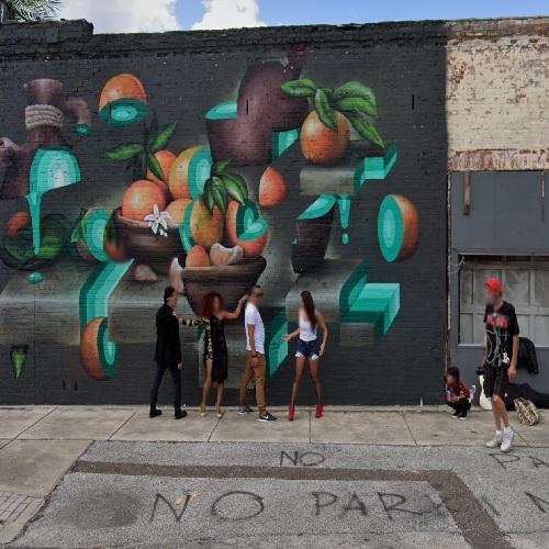 Photo shoot at the Orange Mural in Jacksonville, FL - Virtual Globetrotting