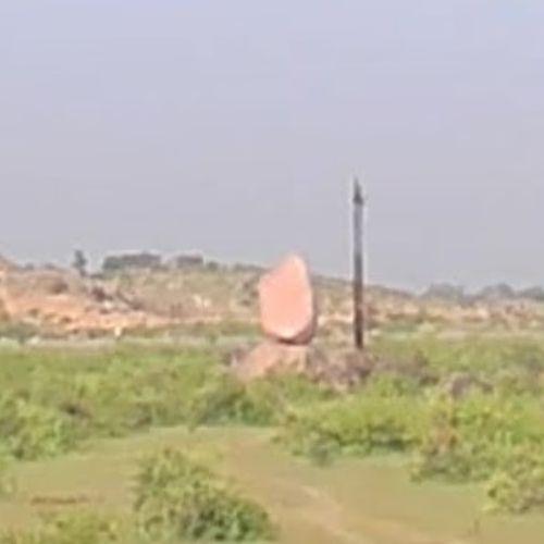 Balancing rock in Lalitpur, India (Google Maps)