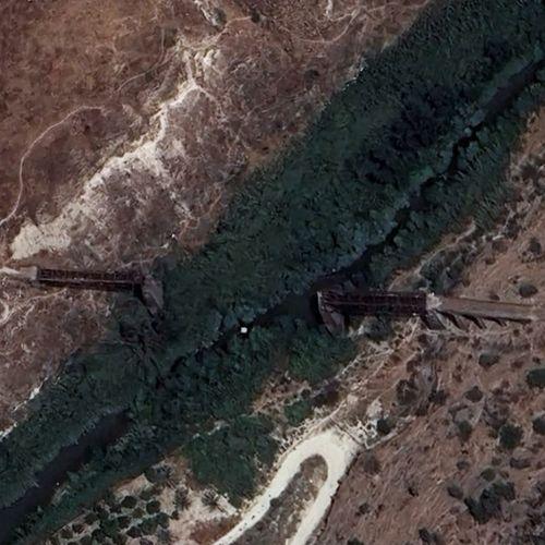 Destroyed railway bridge in Umm Qays, Jordan (Google Maps)