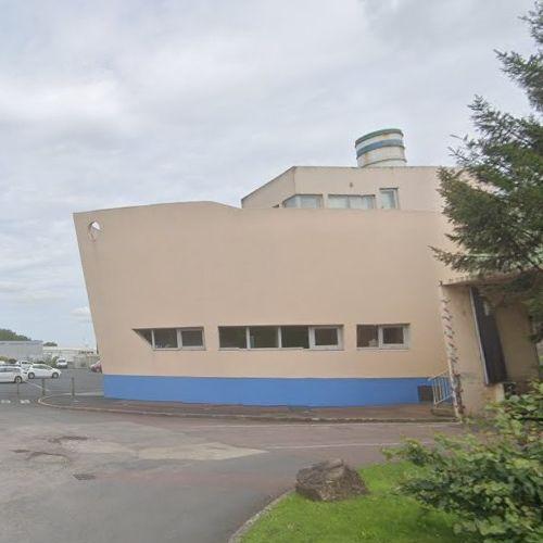 Ship shaped factory building in Carentan, France - Virtual Globetrotting