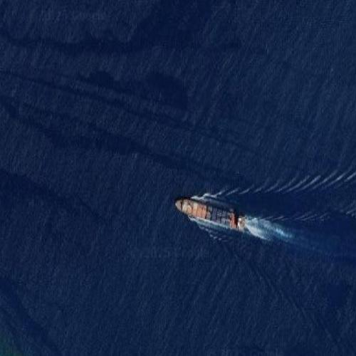 A cargo ship sailing in Port Royal, Jamaica (Bing Maps)